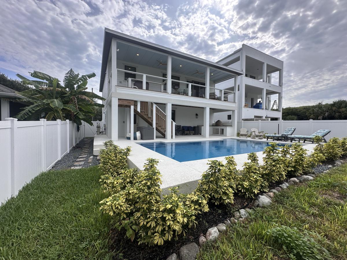 Real Estate - - Landmark Group @ COMPASS Pool Home Search Flagler